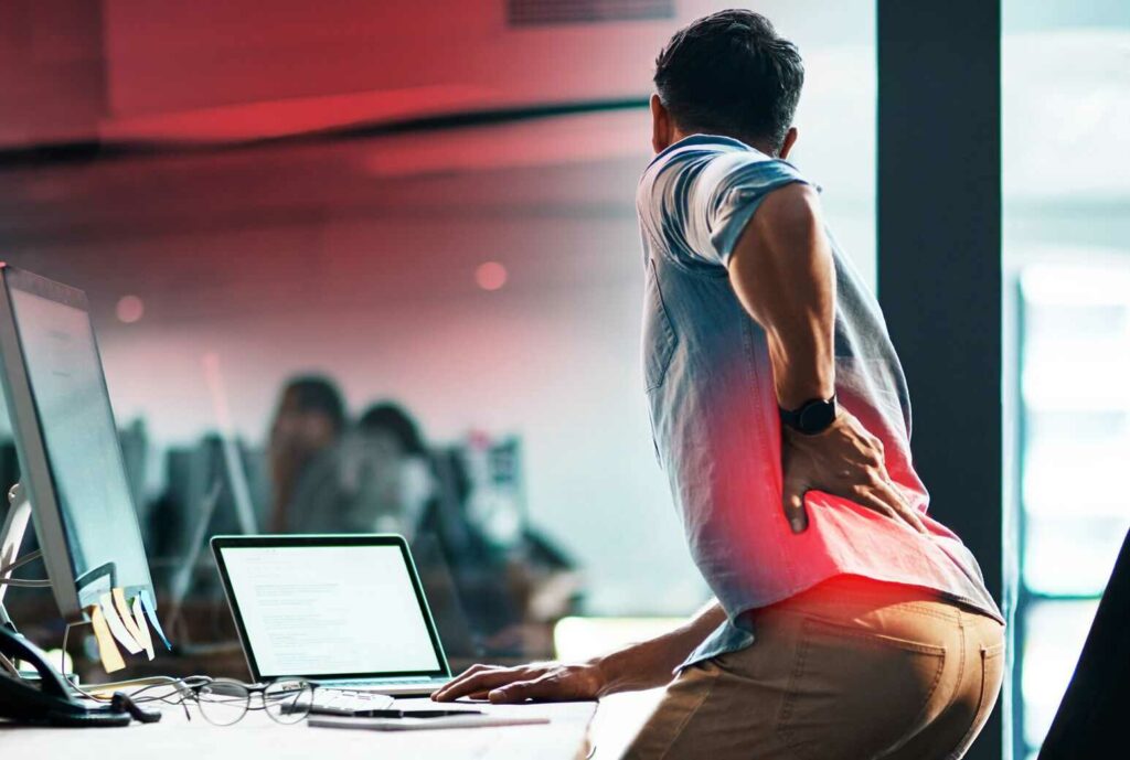 Back Pain At Work: Causes And Tips To Find Relief